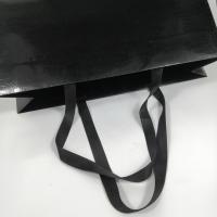 China Hand Length Handle Custom Logo Printed Luxury Black Shoes Clothes Packaging Paper Bag for sale
