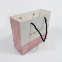 China Offset Printing Paper Gift Packaging Bags Luxury Cosmetic Clothes Gift Carry Bags for sale