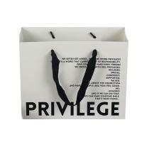 China Small Product Gift Shopping Paper Bag With Handle And Personalized Logo for sale