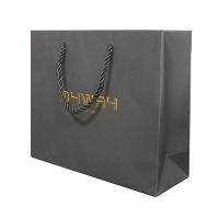 China Custom Printed Shopping Paper Bag Hot Stamping Luxury Shopping Paper Bag for sale