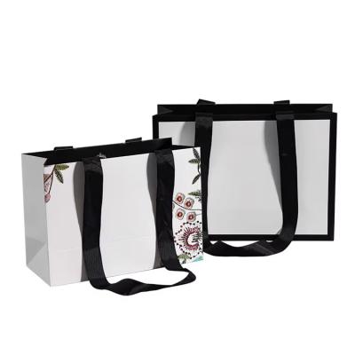 China Custom Logo Printing Hand Length Handle Bags Packaging for Wedding/Jewelry/Cosmetic for sale