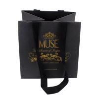 China Matt Black Kraft Paper Gift Bags Clothing Packaging Bags With Handles And String for sale