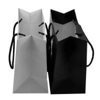 China Black Paper Gift Bags With Handle Luxury Custom Clothing Packaging Bags for sale