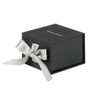 China Custom Logo UV Coating Cardboard Flip Ring Earring Packaging Box with Ribbon Design for sale