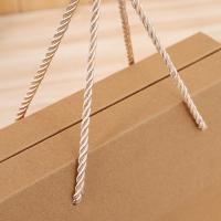 China Custom Recycled Kraft Paper Box with Rope Handle Made from Art Paper for Food Grade Packaging for sale
