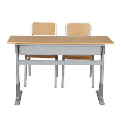China Knocked Down Two Person Classroom Desk with Chair 750x600x400mm Steel Frame for sale