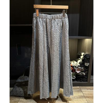 China Jacquard pleated solid color midi skirt autumn new style elegant and slimming versatile elastic waist long skirt for sale