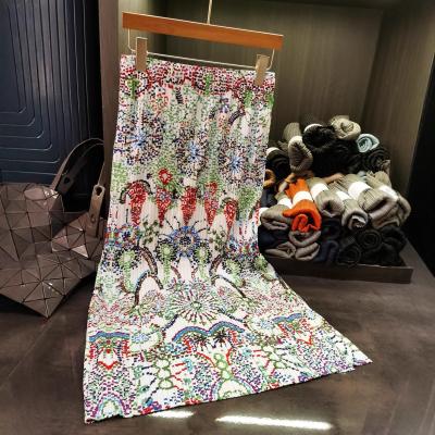 China Summer Bohemian Floral Printed Midi Skirt for Women Casual Mid-Length New Irregular Niche Loose Slimming Versatile Design for sale