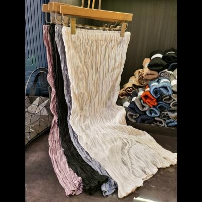 China Women's 2025 Spring Fashion Casual Mid-Length Pleated Half Skirt with Elastic Solid Color and Ruffle Decoration for sale