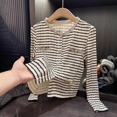 China Pleated Casual Natural Waistline Autumn New Stunning Mini Skirt for Women French Retro Plaid Design Front Breathable Fashion Set for sale