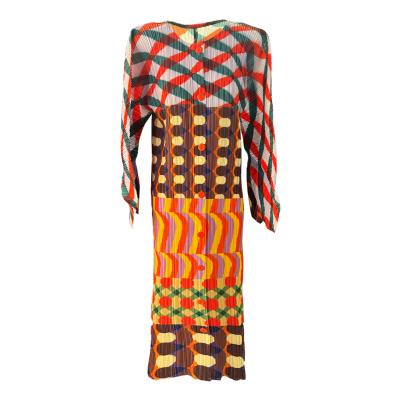 China Uniquely designed irregular printed pleated dress for autumn, loose and casual, slimming long sleeved mid length skirt for sale