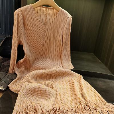 China Striped Gold Dress Temperament V-neck Fashionable  Fringe Pleated Mid Length Skirt for sale