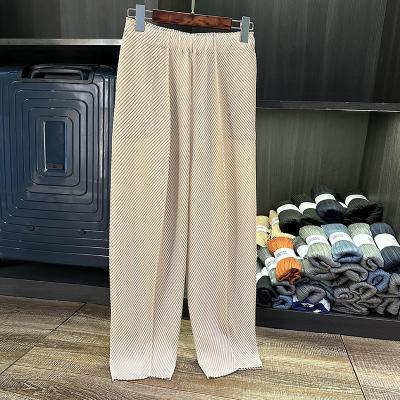 China New design Women's High-End Dragon Scale Pleated Tapered Pants Versatile Slimming Elastic Satin Waist Loose Casual for Autumn for sale
