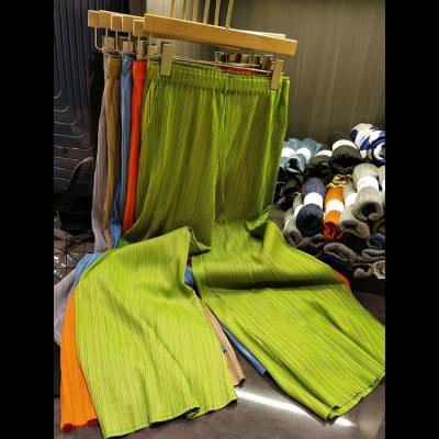 China Spring 2025 Women's Loose Solid Color Pleated Elastic Plus Size Women's Pants for sale