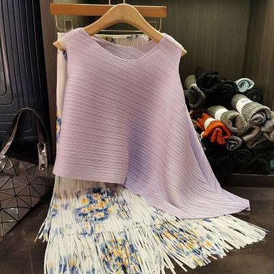 China Summer New Short Length Above Knee Irregular Pleated Round Neck Sleeveless Vest with Fashionable Printed Tassel Skirt Set for sale