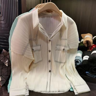 China Women's Elegant Slimming Single-Breasted Age-Reducing Shirt Solid Color Pleated Button New Pocket Knitted Polyester for sale