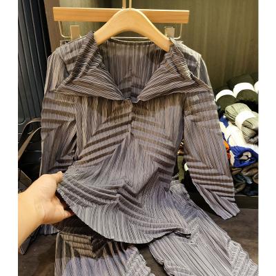 China Advanced Sense New Autumn Female Two-Piece Set Hot Selling Long Sleeve Pleated Top and Loose Fit Lapel Pants One Color for sale