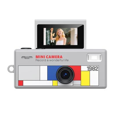 China DLC  Mini Flip Screen Thumb Camera Small Pocket Sports Camera Student Kids Photo Video Recording Camera for sale