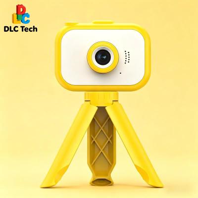 China DLC Kids Digital Camera 9600W Dual Lens 1080P HD Video 2.0 Inch IPS Blue Light Filter Screen Handheld Stand Design Rechargeable for sale