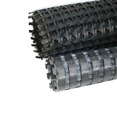 China Bitumen Coating Road Paving Fiberglass Geogrid Asphalt Reinforcement for sale