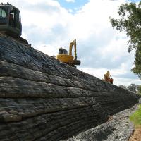 China High Strength PP/ HDPE Uniaxial Plastic Geogrid For Retaining Wall for sale