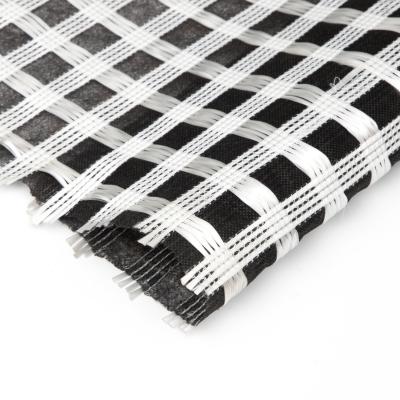 China Composite Biaxial Fiberglass Geogrid With Nonwoven Geotextile For Soil Reinfocement/Road Construction Material Geocompos for sale