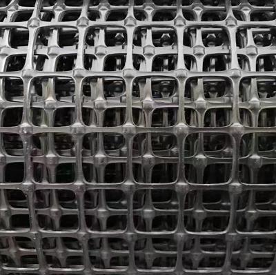China High Tensile Strength Biaxial Plastic Mesh For Soil Reinforcement 30kN/m Black PP/PET Grid For Road Base Stabilization for sale