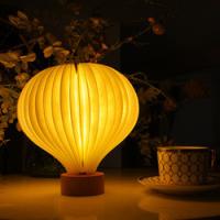 China Bedside Real Wood Table Lamp Creative Hot Air Balloon Design Dupont Paper Night Lights Gifts for sale