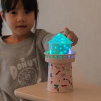 China 2022 Creative Gift 360 degree Rotating Watchtower Projection lamp 1500mAh Rechargeable sleeping Night Light Music Box Fo for sale