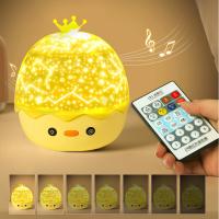 China Funny Remote Control Crown Duck Projector Lamp Night Light Music Box For Kids Toddlers Baby Gifts Free with 6 Projection for sale