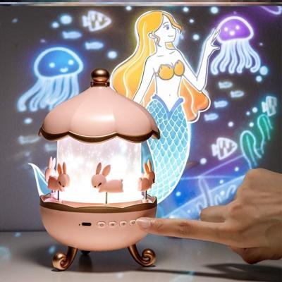 China Romantic Rotary House Starry Sky Projector Night Light Kids Adults Dream Cosmic Projection LED Lamp With Music Wireless for sale