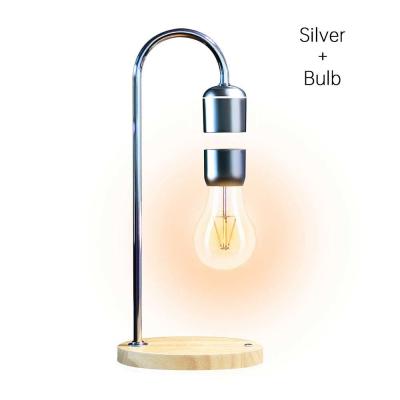 China Magnetic Levitating Floating Wireless LED Light Bulb with Wireless Charger for Desk Lamp Home Room Office Decor Unique G for sale