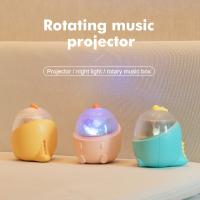 China New Cute Dinosaur Sky projection Night Light Rotating Music box Projector USB rechargeable table lamp For Kids Holiday G for sale