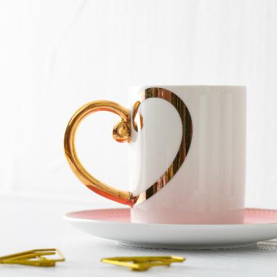 China Red Unique Fox Decal Design Ceramic Coffee Cup And Saucer With Golden Handle for sale