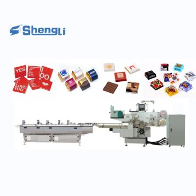 China Candy Bar Packaging Machine 200pcs/Min-260pcs/Min Chocolate Envelope Wrapping Machine for sale