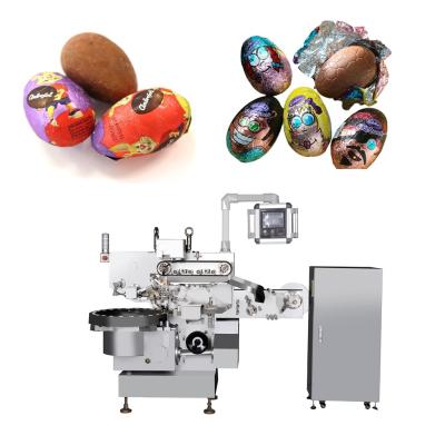 China Efficient and Reliable Chocolate Hollow Ball Foil Wrapping Machine for High-Quality Wrapping Finish and Ball Integrity for sale