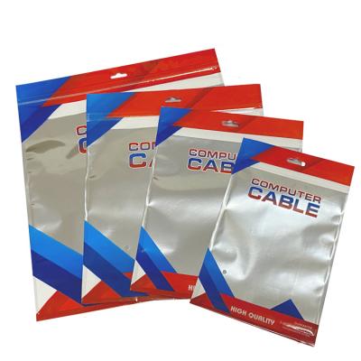 China Zipper Top Custom Logo Waterproof Mylar Bag Plastic Industrial Packaging Electronic Data Cables Earphones Hanging Hole for sale