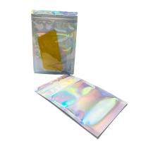 China 10x15cm Customized Thickness Resealable Stand Pouch 3.5g Yellow Holographic Glitter Mylar Packaging Bags Smell Proof PET Plastic for sale