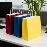 China Clothes Paper Shopping Bag Customized Logo Kraft Paper Shopping Bags White Brown Twisted Handle Eco Friendly Printing Paper Bags for sale