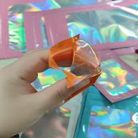 China LDPE Plastic 18x26 Shiny Holographic Plastic Bag Transparent Window YinYang Self sealing Zipper Pouch Gravure Printing for sale