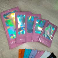 China LDPE Plastic 18x26 Shiny Holographic Plastic Bag Transparent Window YinYang Self sealing Zipper Pouch Gravure Printing for sale