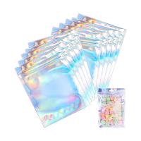 China Recyclable Printed Biodegradable Holographic Bags Aluminum Foil Stand Pouch Zipper Tear Notch Smell Proof Candy Packaging Bag for sale