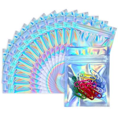China Customized Size Transparent Holographic Biodegradable Zipper Bag Smell Proof Food Storage Jewelry Craft Cosmetics Packaging for sale