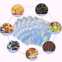China Customized Size Transparent Holographic Biodegradable Zipper Bag Smell Proof Food Storage Jewelry Craft Cosmetics Packaging for sale