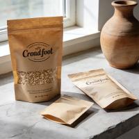 China Food Nuts Snack Kraft Paper Stand Pouch Packaging Paper Bag with Hanging Hole Custom Biodegradable Biscuit Candy Meat Jerky for sale