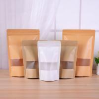 China Food Nuts Snack Kraft Paper Stand Pouch Packaging Paper Bag with Hanging Hole Custom Biodegradable Biscuit Candy Meat Jerky for sale