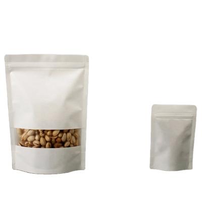 China Customized Color Kraft Paper Stand Up Snack Packing Zipper Pouch Bags Matte Window Tear Notch Black Color Resealable Food for sale
