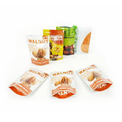 China Zipper Top Custom Printed PE PET Plastic Stand Up Pouch with Accepted Logo Walnut Gravure Printing Dry Cashews Ziplock Bag for sale