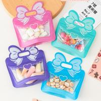 China PET Plastic Custom Printing Self Supporting Packaging Bow High End Children Gift Bag Biodegradable Food Grade Mylar Bag for sale