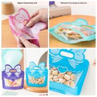 China PET Plastic Custom Printing Self Supporting Packaging Bow High End Children Gift Bag Biodegradable Food Grade Mylar Bag for sale